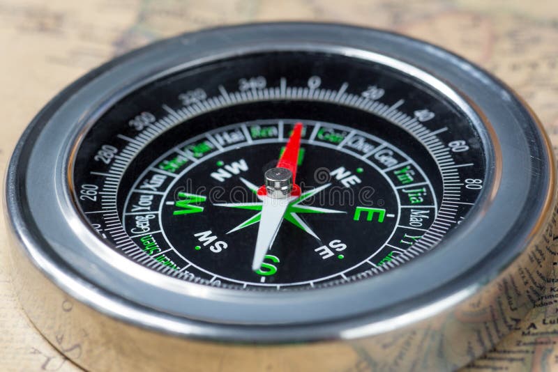 The Black Compass on Old Vintage Map, North Atlantic Ocean, Macro ...