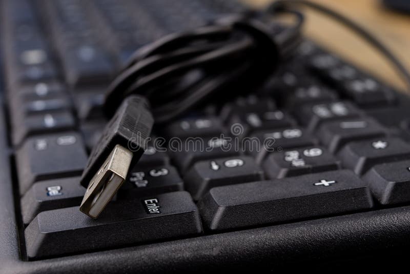 A Black Computer Keyboard and an Enlarged USB Port. Computer ...