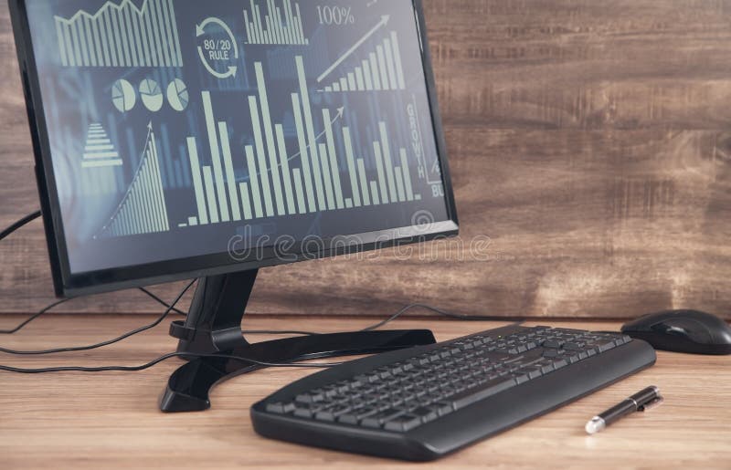 Black Computer with Keyboard and Mouse on the Table. Graphs and Charts ...