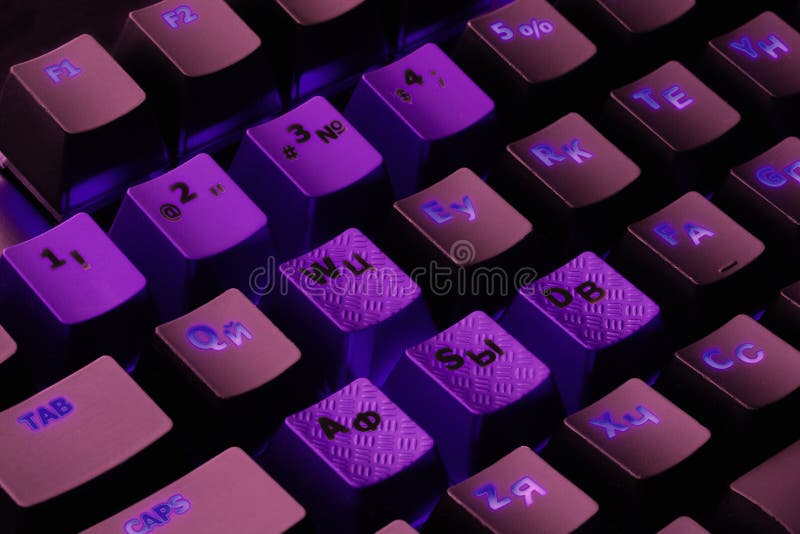 Black Computer Keyboard with Purple Keys, Latin and Cyrillics Stock ...