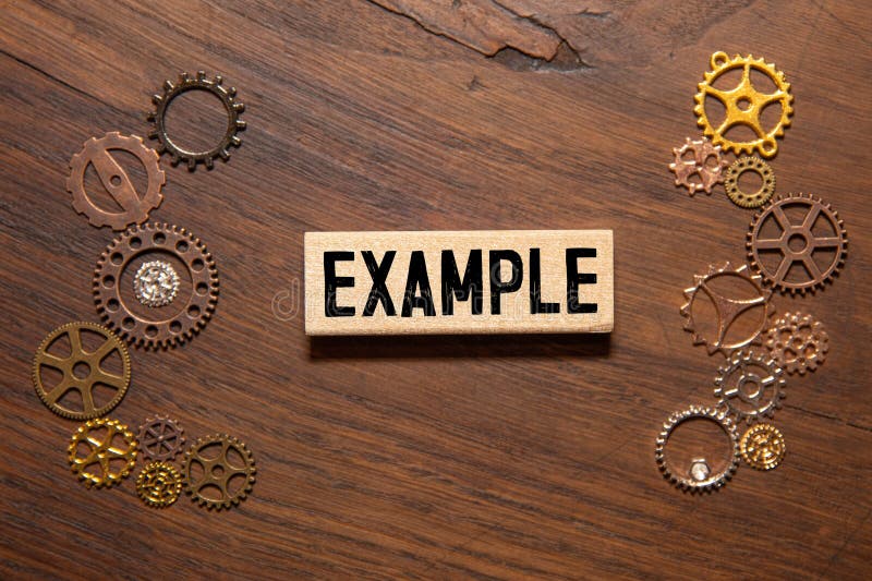 On a Black Computer Keyboard There is a White Card with the Text ...