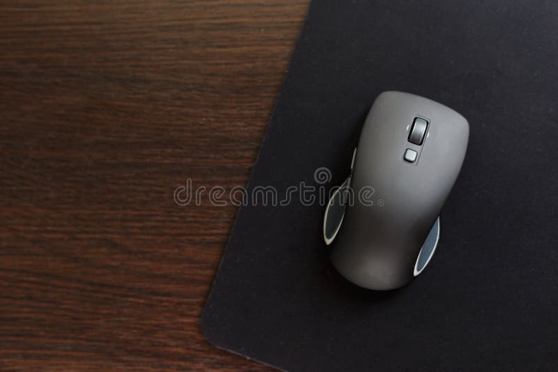 Black Computer Mouse Close-up on a Black Mat Stock Image - Image of ...