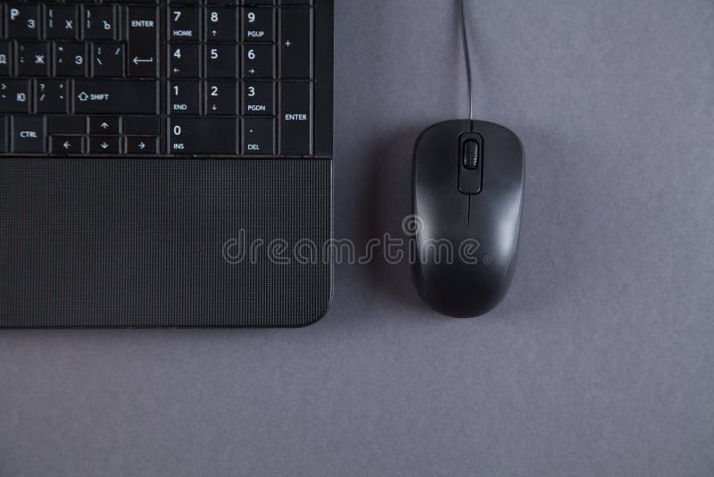 Black Computer and Mouse on Gray Table with Empty Screen Stock Photo ...