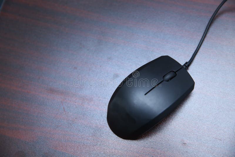 Mouse Red Furniture on the Table . a Black Computer Mouse Stock Photo ...