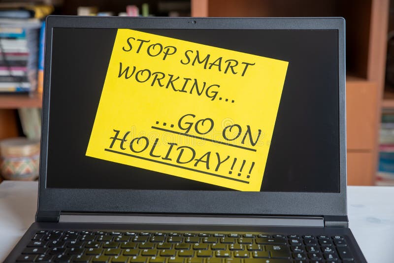 Computer and Sheet with Text `stop Smart Working, Go on Holiday`. Stock ...