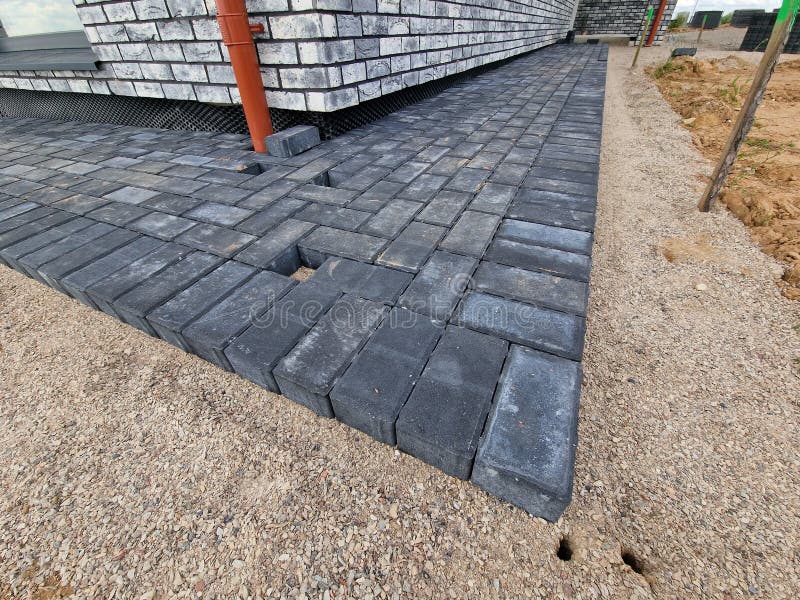 Black Concrete Brick Pavement during Laying Process Stock Image - Image ...