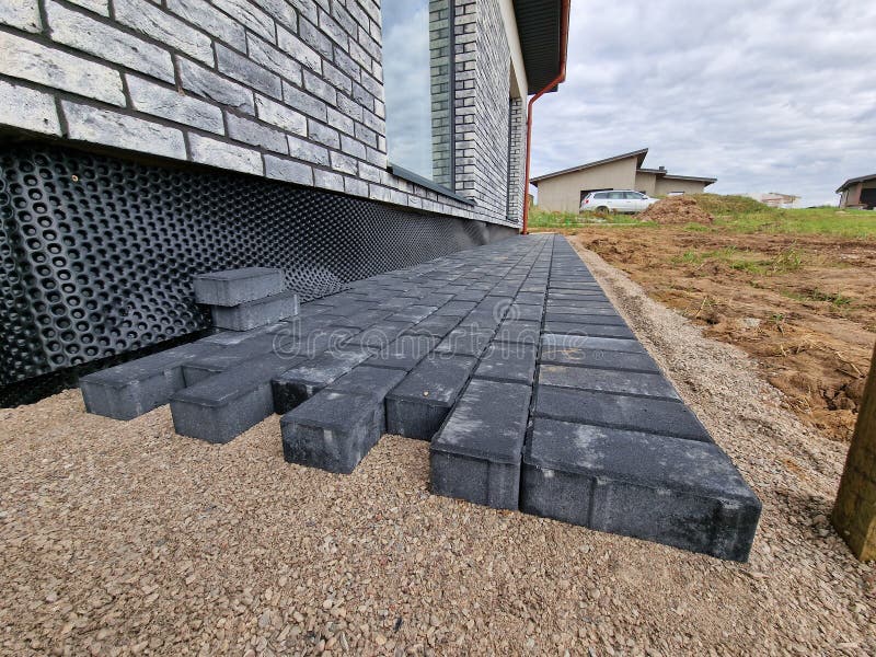 Black Concrete Brick Pavement during Laying Process Stock Image - Image ...