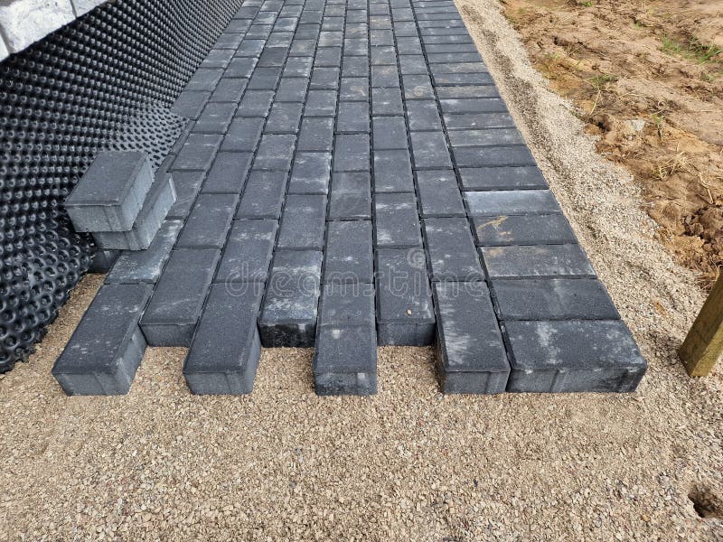 Black Concrete Brick Pavement during Laying Process Stock Image - Image ...