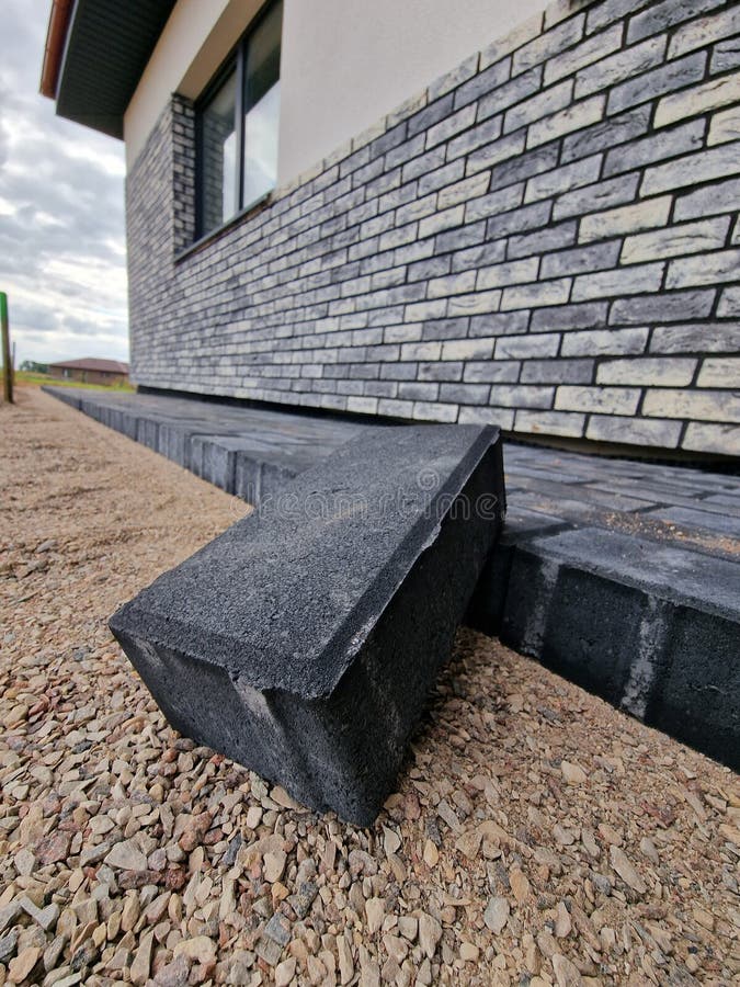Black Concrete Brick Pavement during Laying Process Stock Photo - Image ...