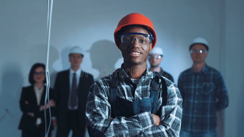 Black Constructor Putting Protective Equipment Stock Footage - Video of ...