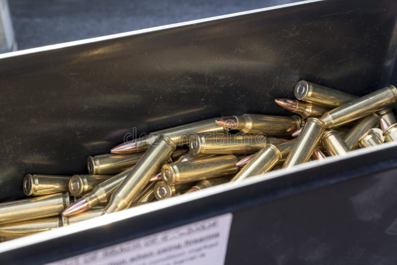 Black Container Box with a Pile of Copper Bullets Inside Stock Photo ...