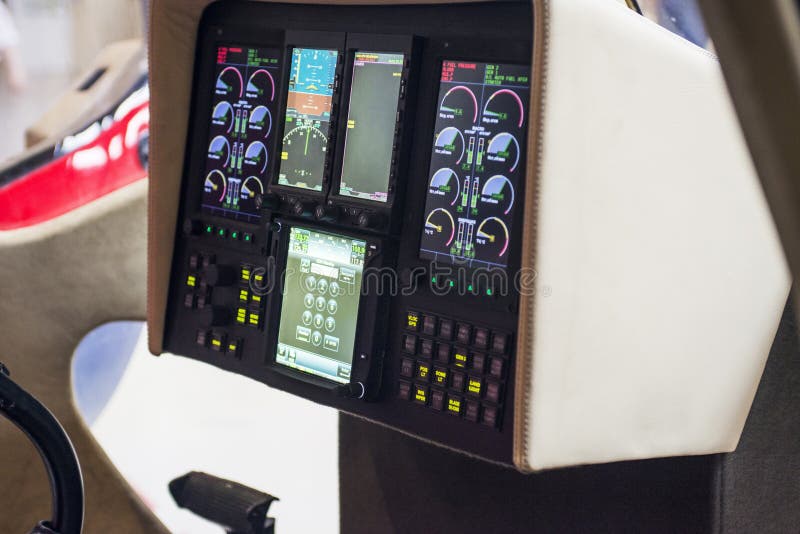 Black Control Panel in a Helicopter Cockpit. Instruments Panel of a ...