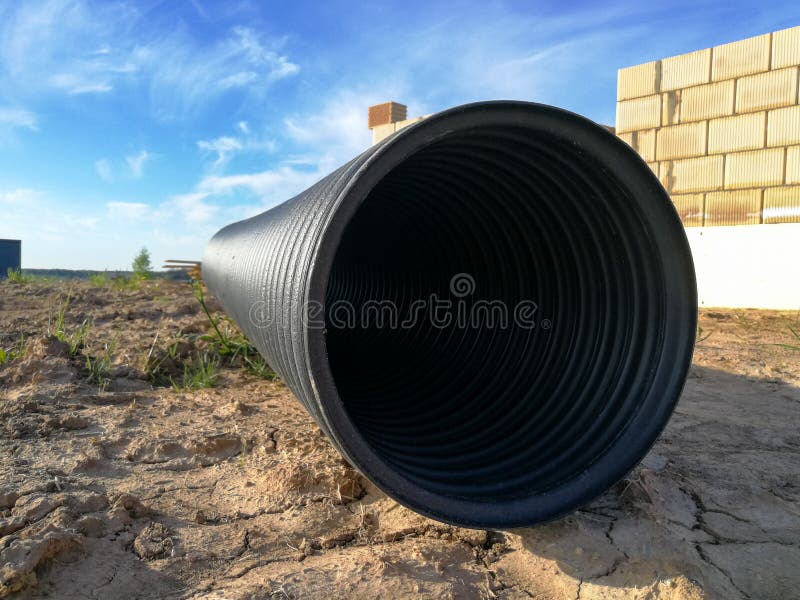 Black Corrugated Pipe for Water Canalization Stock Image - Image of ...