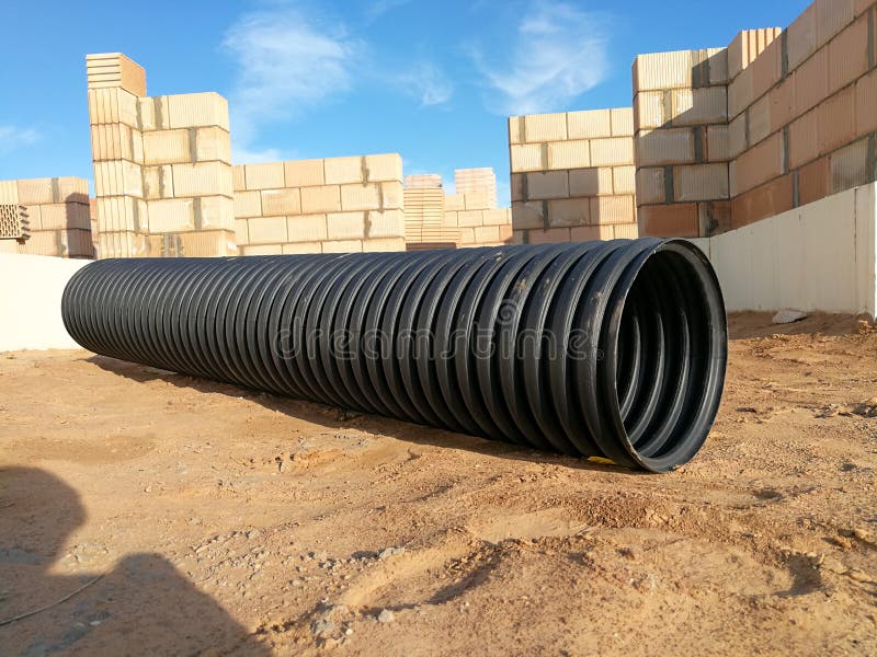 Black Corrugated Pipe for Water Canalization Stock Image - Image of ...