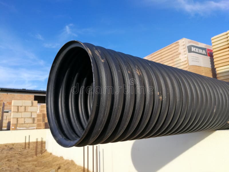 Black Corrugated Pipe for Water Canalization Stock Photo - Image of ...