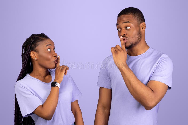 Black Couple Puting Finger on Lips, Making Hush Sign Stock Image ...