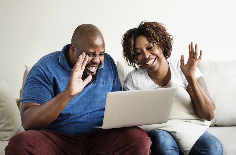 Black Couple Using Digital Device Laptop Stock Photo - Image of ...