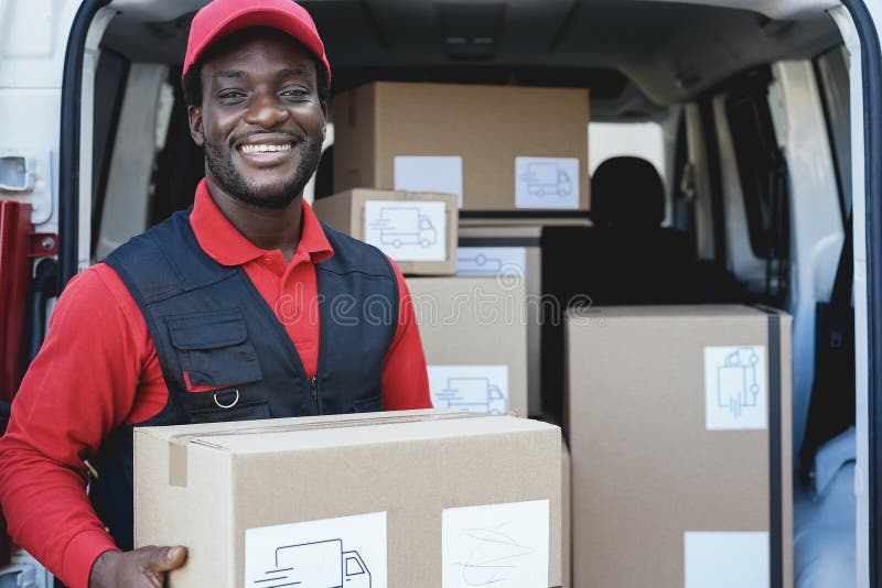 Black Courier Man Delivering Package in Front of Cargo Truck - Focus on ...