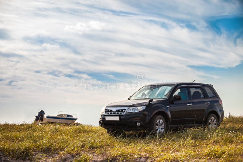 Black Crossover at Sea Coast Stock Photo - Image of boat, environment ...