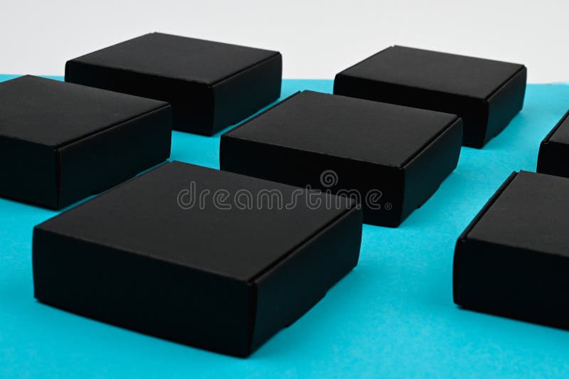 Black Cubes Side View. Black Boxes on Blue. Black Boxes on a Blue ...
