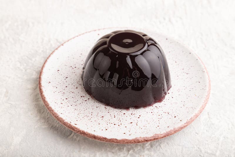 Black Currant and Grapes Jelly on Gray Concrete. Side View Stock Image ...