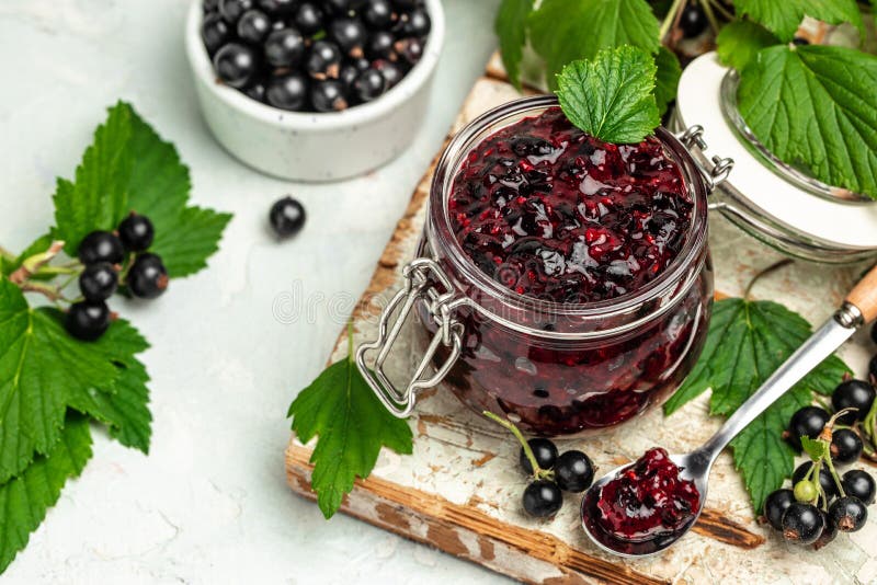 Black Currant Jam Curd, Custard or Jam in Jar. Place for Text, Top View ...