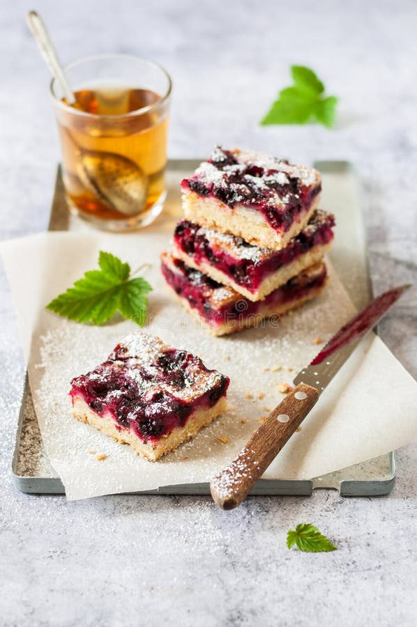 Black Currant Slice with a Glass of Tea Stock Photo - Image of cement ...