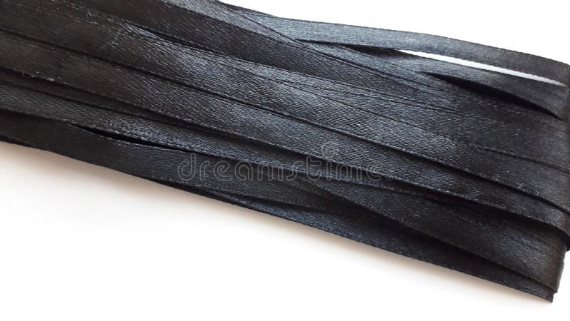 Black Decorative Ribbon on a Light Background. Decorative Trim. Stock ...