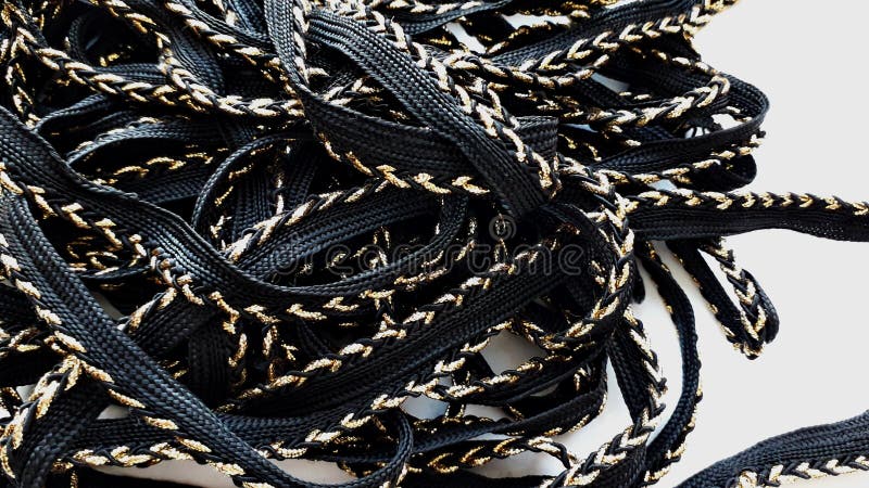 Black Decorative Ribbon on a Light Background. Decorative Trim. Stock ...