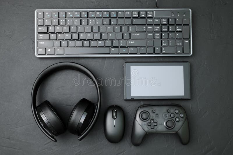 Black Devices: Gamepad, Computer Mouse, Keyboard, Headset and Tablet Pc ...