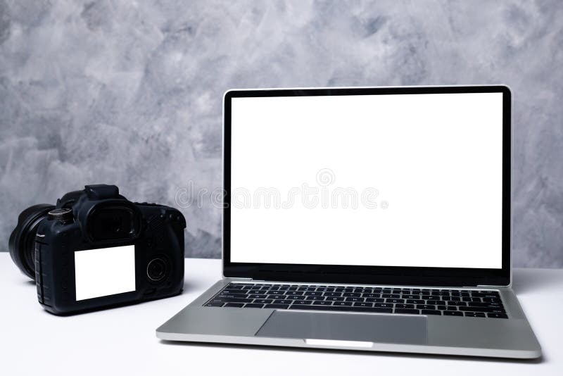 A Black Digital Camera and a Computer Laptop on Table Stock Image ...