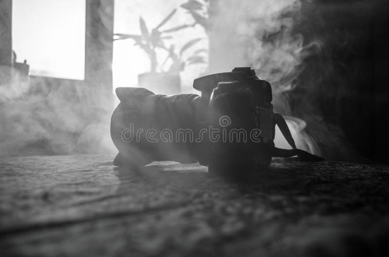 Black Digital Camera on Dark Background. Stock Photo - Image of ...