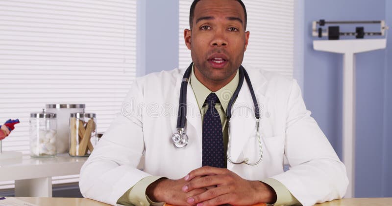 Black Doctor Listening and Talking To Camera Stock Video - Video of ...