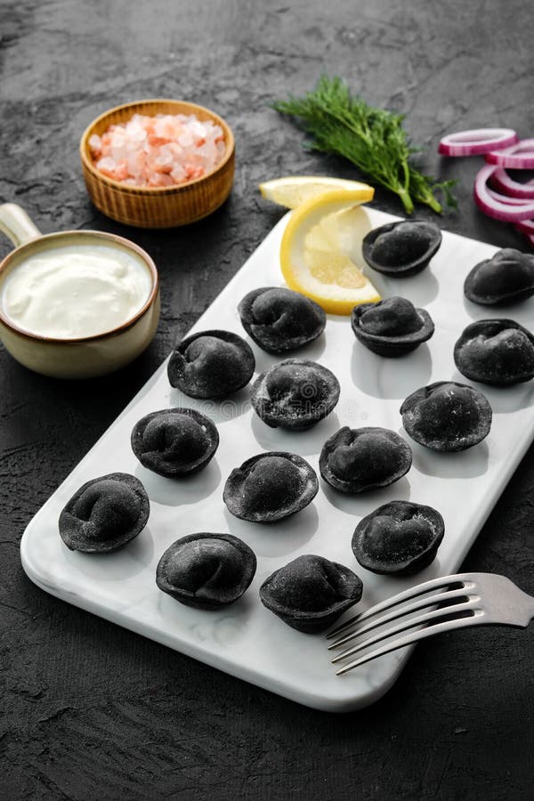Black Dumplings with Beef with Dough with Cuttlefish Ink Stock Image ...