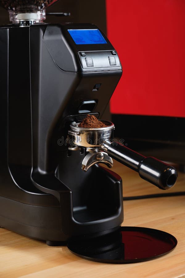 Black Electric Grinder is on a Wooden Table Stock Image - Image of ...