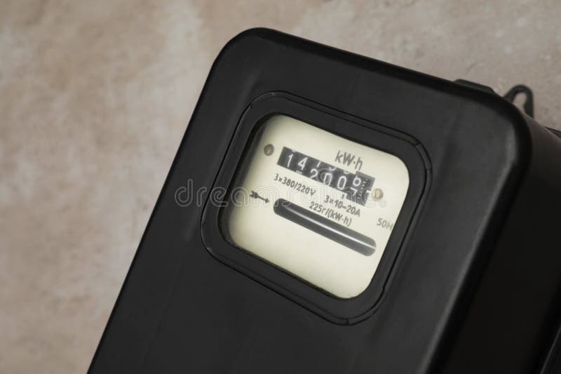 Black Electric Meter on Grey Background, Closeup. Measuring Device ...