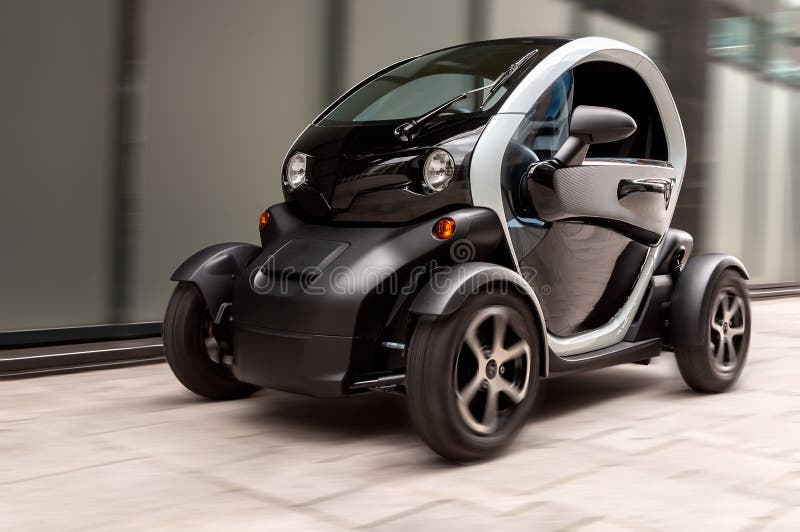 Black Electrical Car Moving at Speed in City Editorial Image - Image of ...