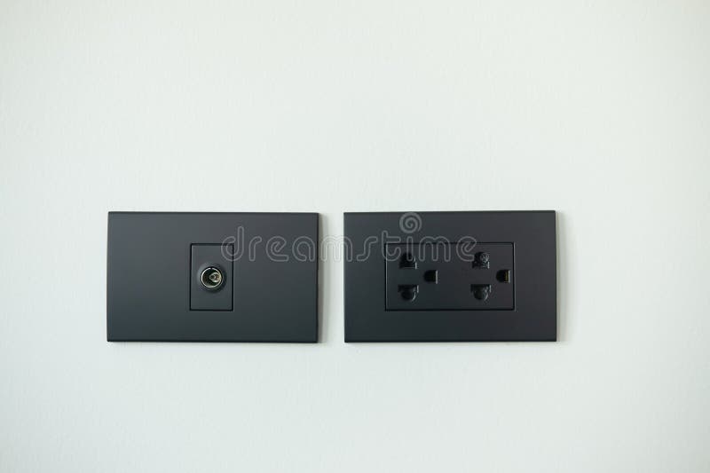 Black Electrical Outlet and Inserts the Antenna Cable To the TV Outlet ...