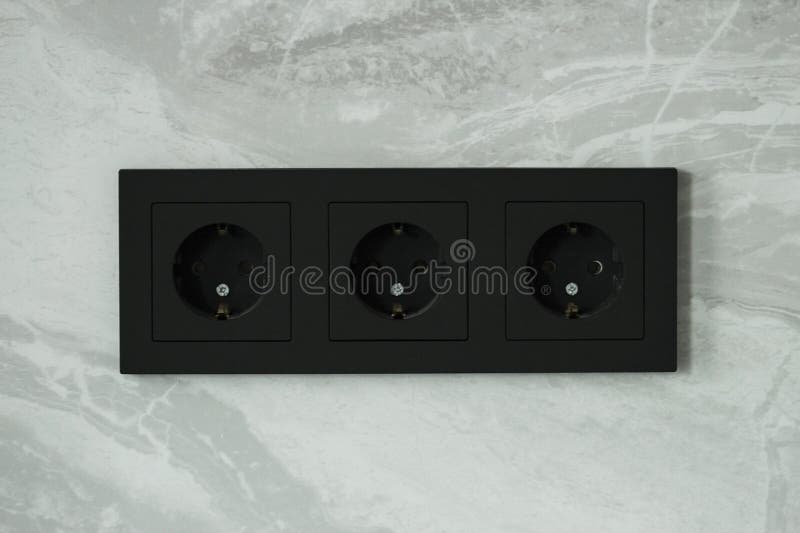 Black electrical sockets stock photo. Image of decorative - 333700472