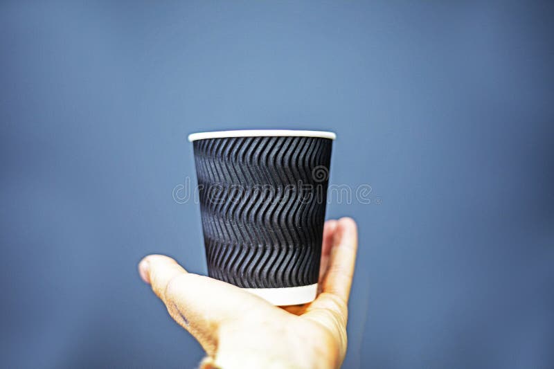 Black Embossed Disposable Cup on a Gray Background. Mockup for Design ...