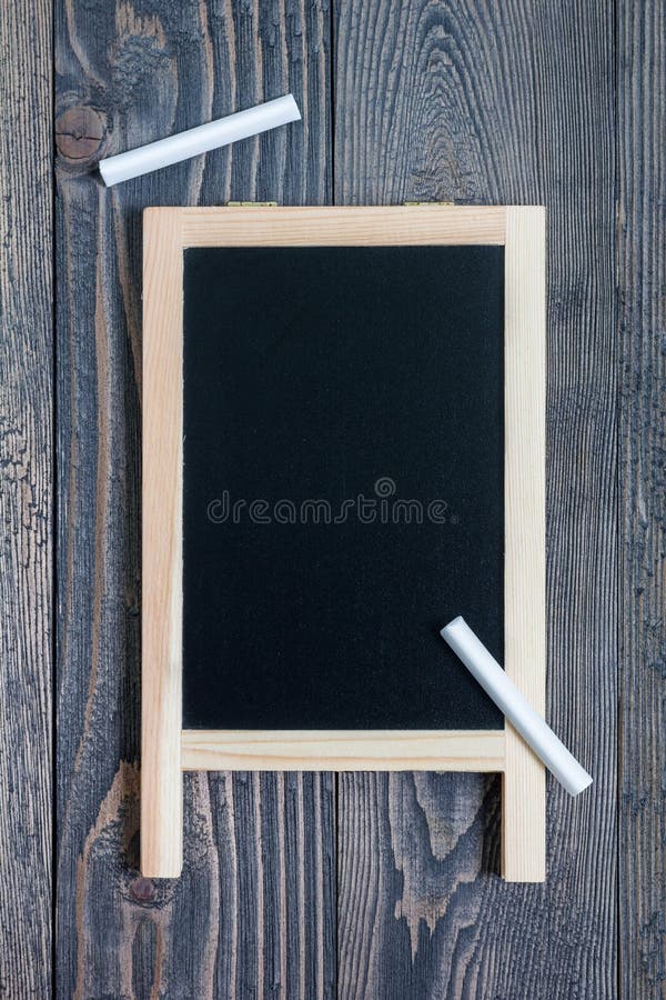 Black Empty Chalkboard for Copy Space with Pieces of Chalk Stock Image ...