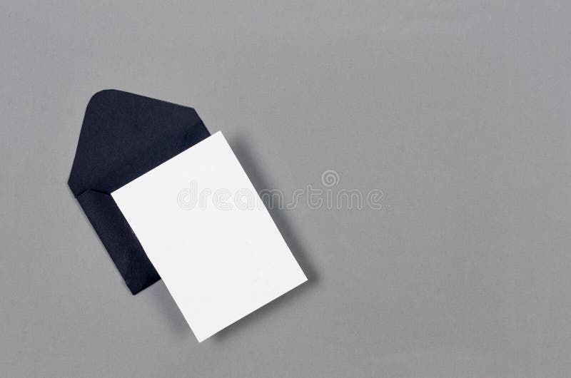 Black Envelope with Empty White Card for Text on Grey Background Stock ...