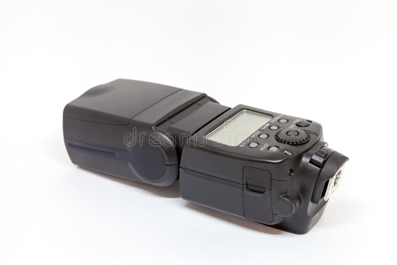 Black External Flash for a Camera with an Open Battery Compartment ...