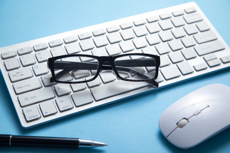 Black Eyeglasses on the Computer Keyboard Stock Photo - Image of ...