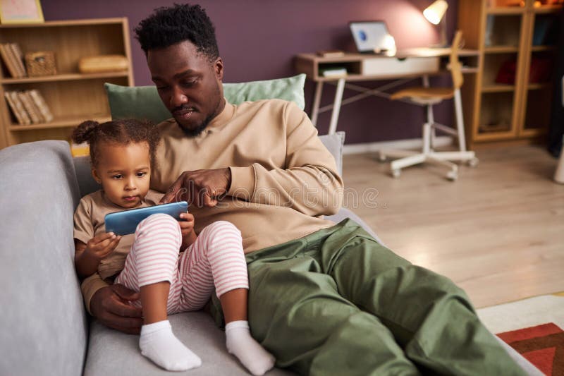 Black Father Teaching Little Girl Using Smartphone Stock Image - Image ...