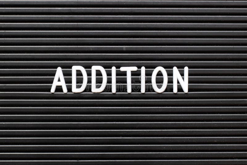 Black Board with White Alphabet in Word Addition Background Stock Image ...