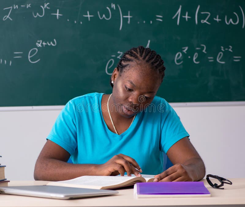 Black Female Student in Front of Chalkboard Stock Photo - Image of ...