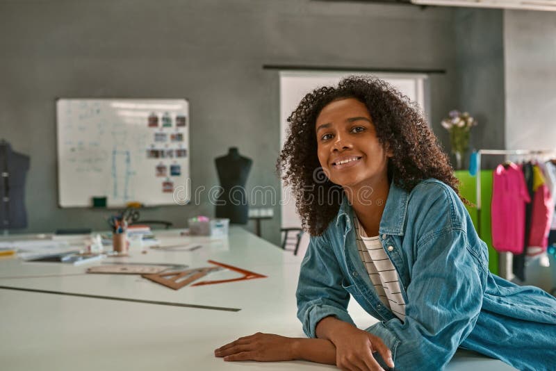 Black Female Tailor at Table in Designer Office Stock Photo - Image of ...