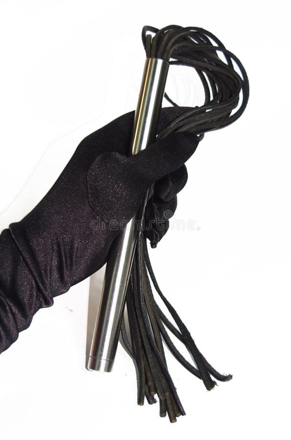 Woman with a whip in hand stock photo. Image of whip - 41788616
