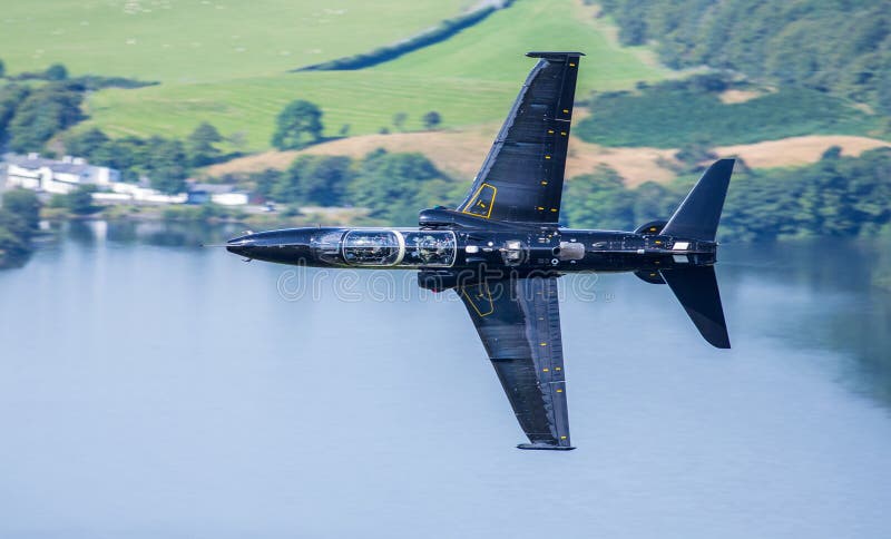 Black fighter jet T2 Hawk stock image. Image of flying - 44080869